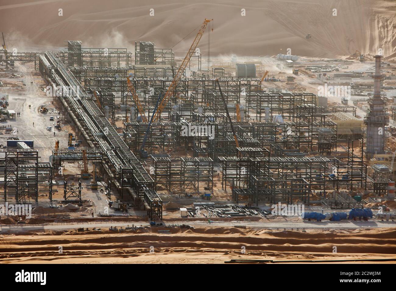 Frameworks for pipe runs and other oil processing equipment under ...
