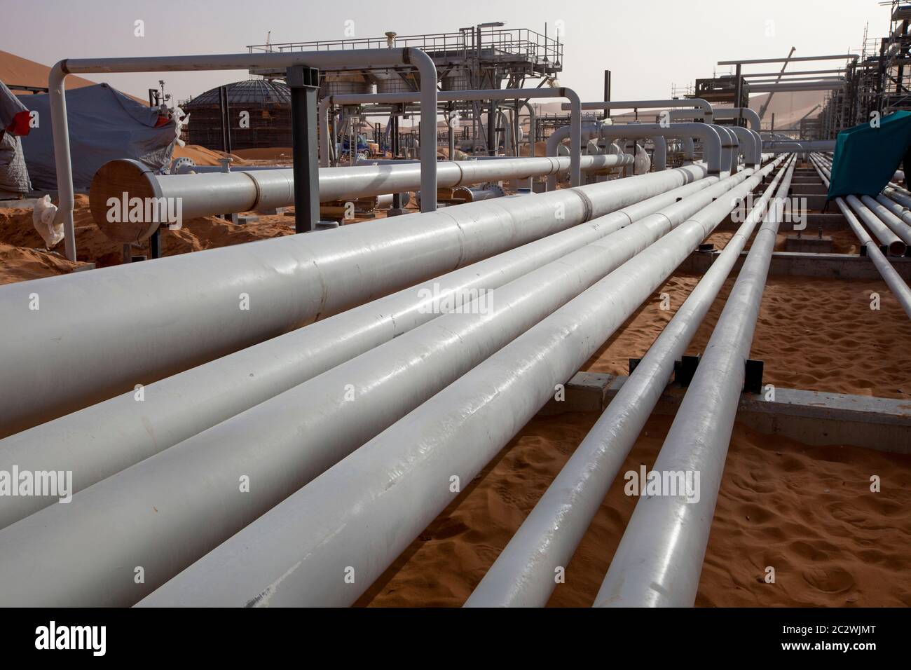 Pipe runs begin to take shape In the construction of a new oil facility ...