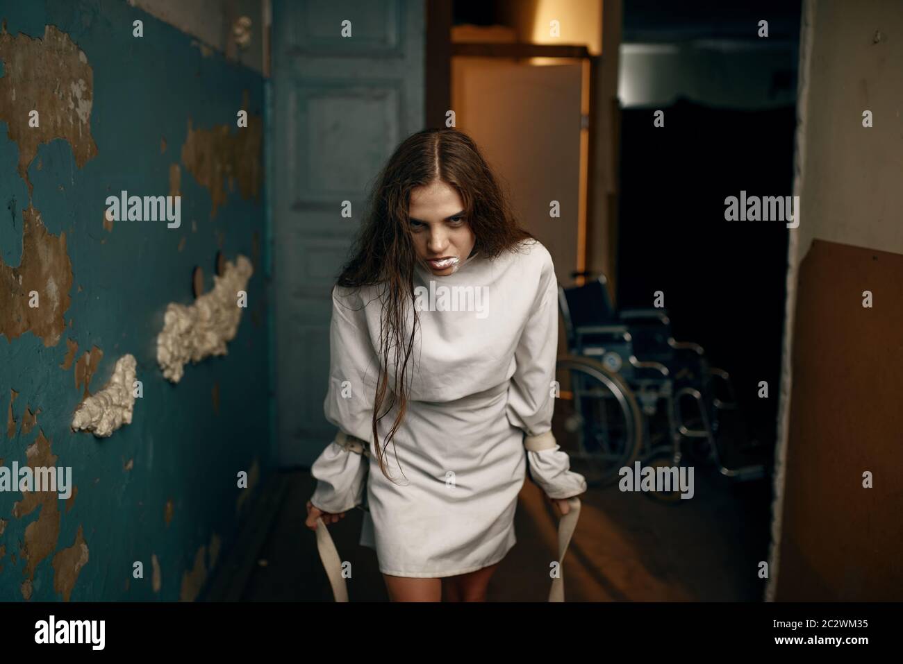 Female straight jacket mental hi-res stock photography and images - Alamy