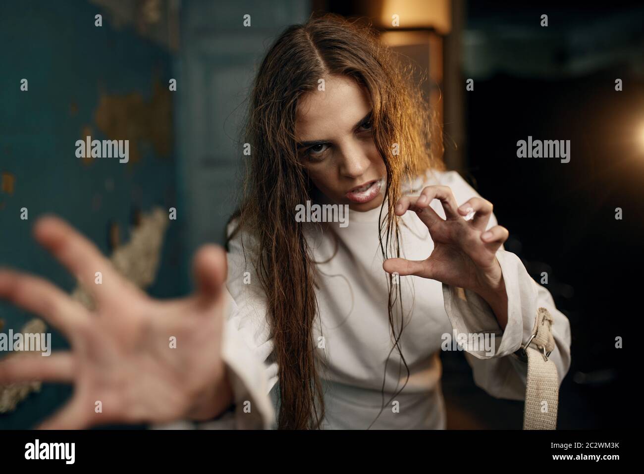 Female straight jacket mental hi-res stock photography and images - Alamy