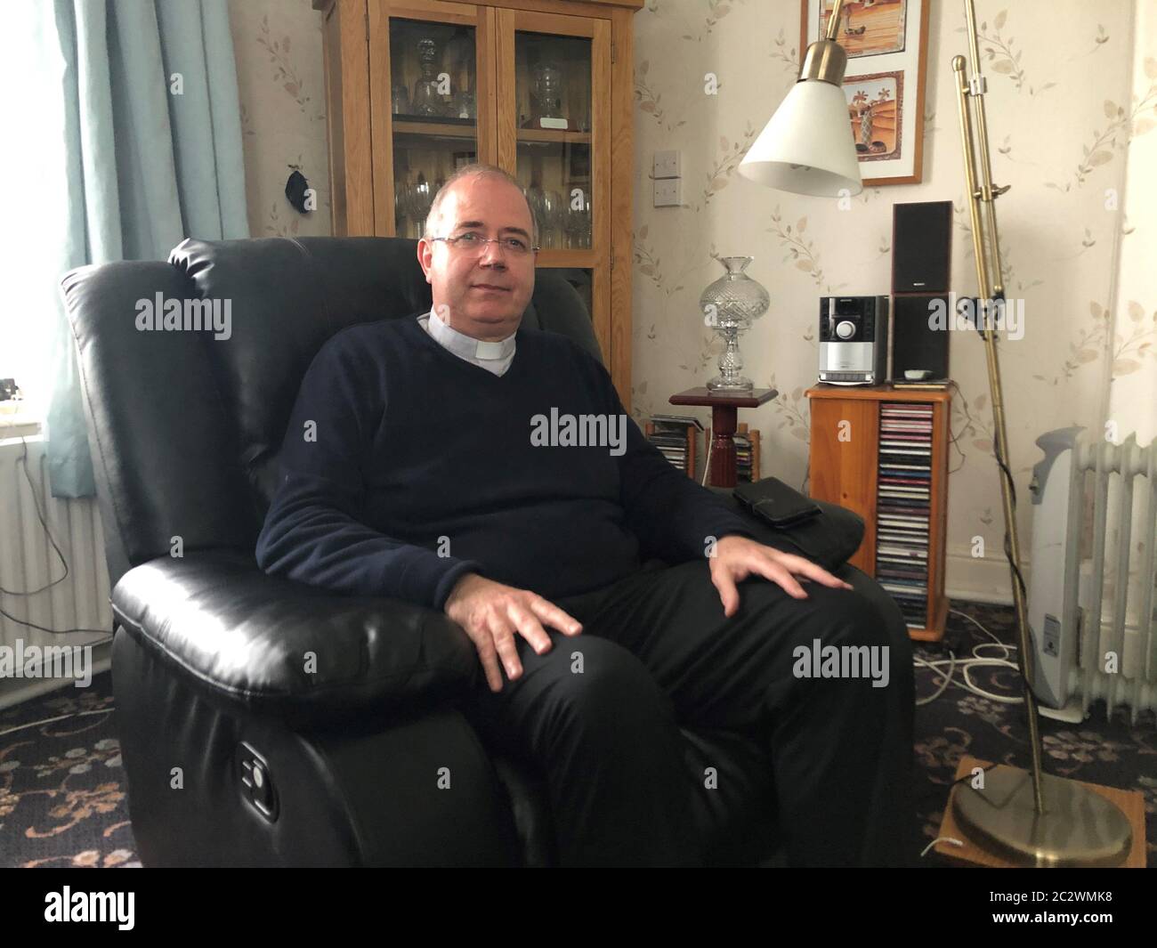 Local parish priest Father John McManus who gave the last rites to ...