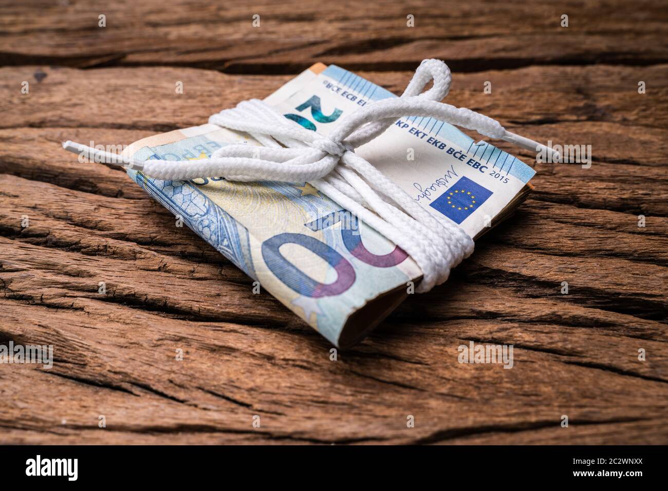 Banknotes tied hi-res stock photography and images - Alamy