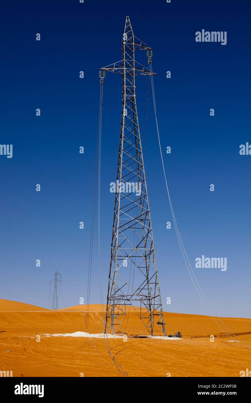 Electricity pylons having their high voltage cables installed to carry ...