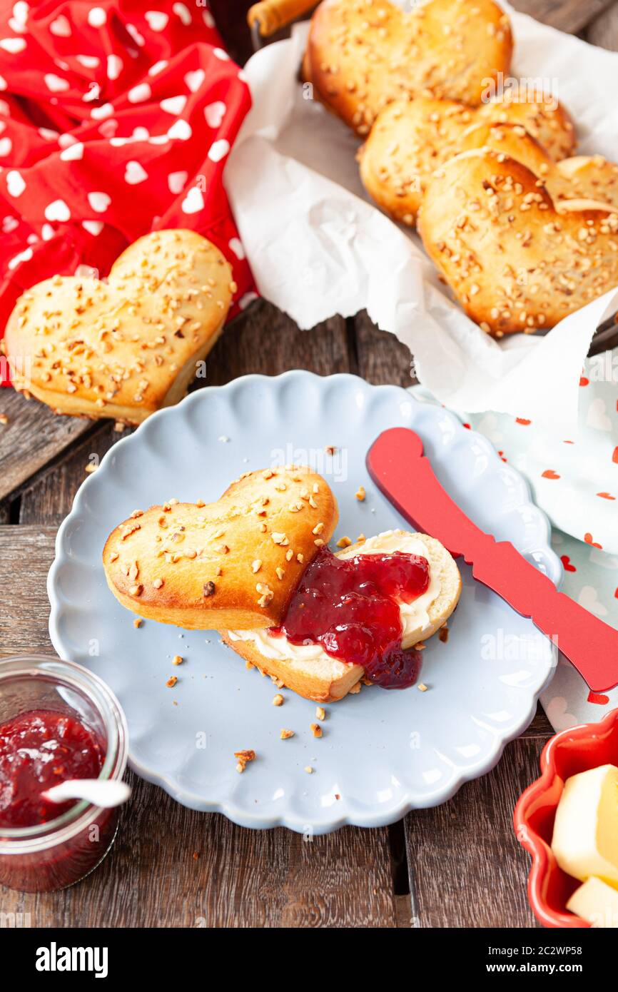 Homemade heart bread rolls with raspberry jam Stock Photo - Alamy