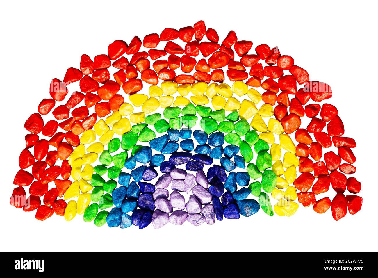 rainbow made out of colored stone on white background Stock Photo - Alamy