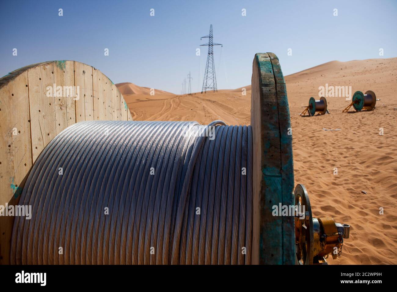 Electricity pylons having their high voltage cables installed to carry ...