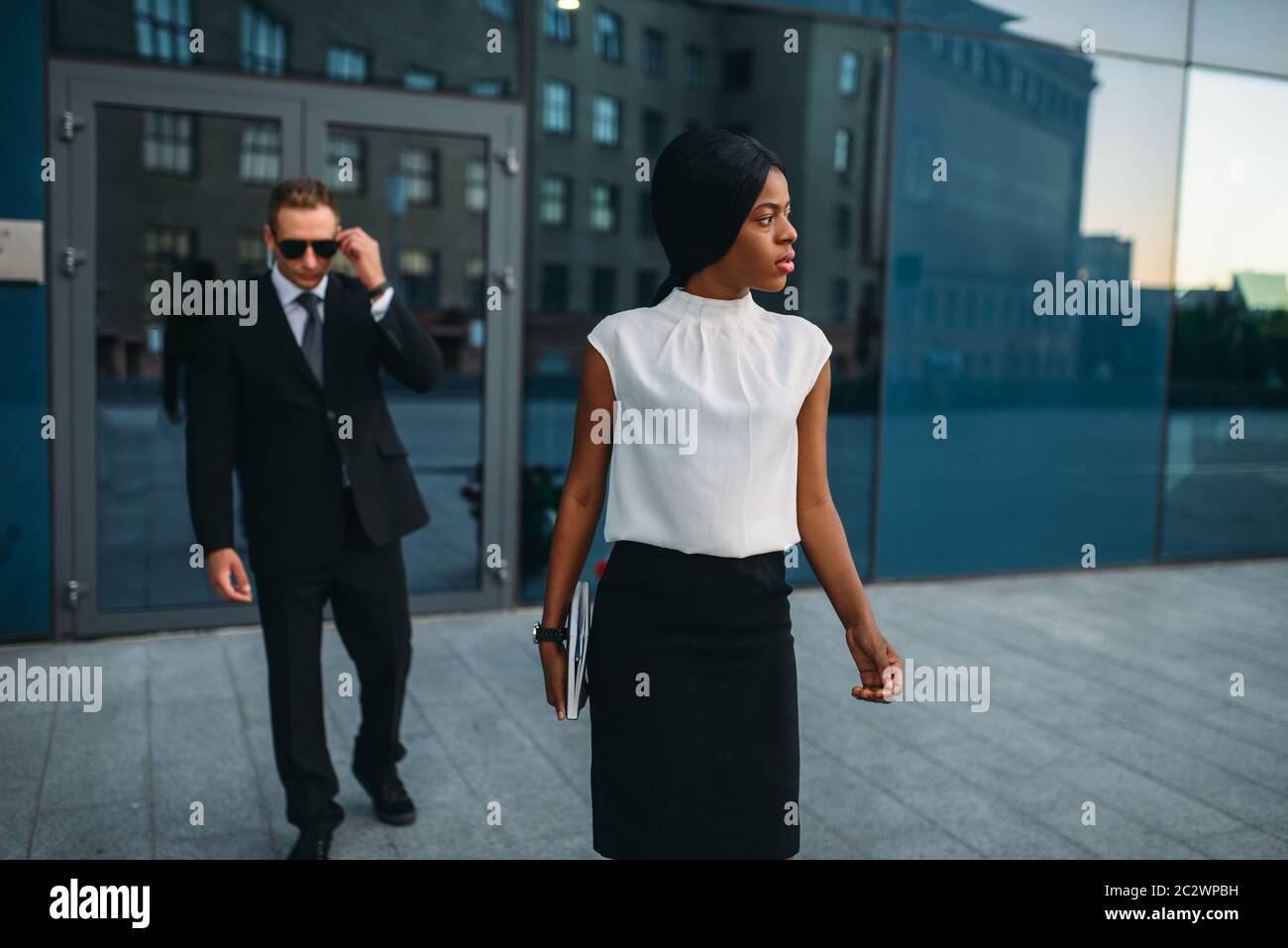 Woman security guard in suit hi-res stock photography and images - Alamy