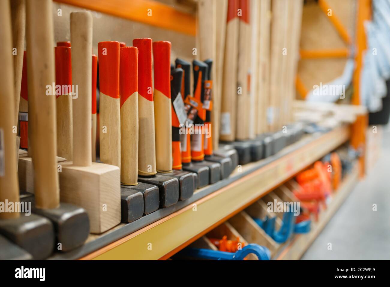 Hardware store assortment, shelf with hammers, nobody. Building ...
