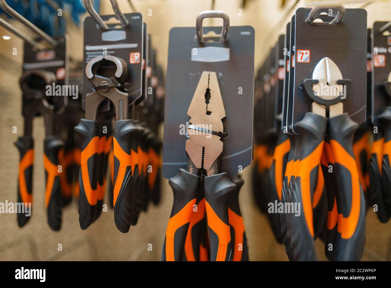 Hardware store assortment, shelf with cutters, nobody. Building ...