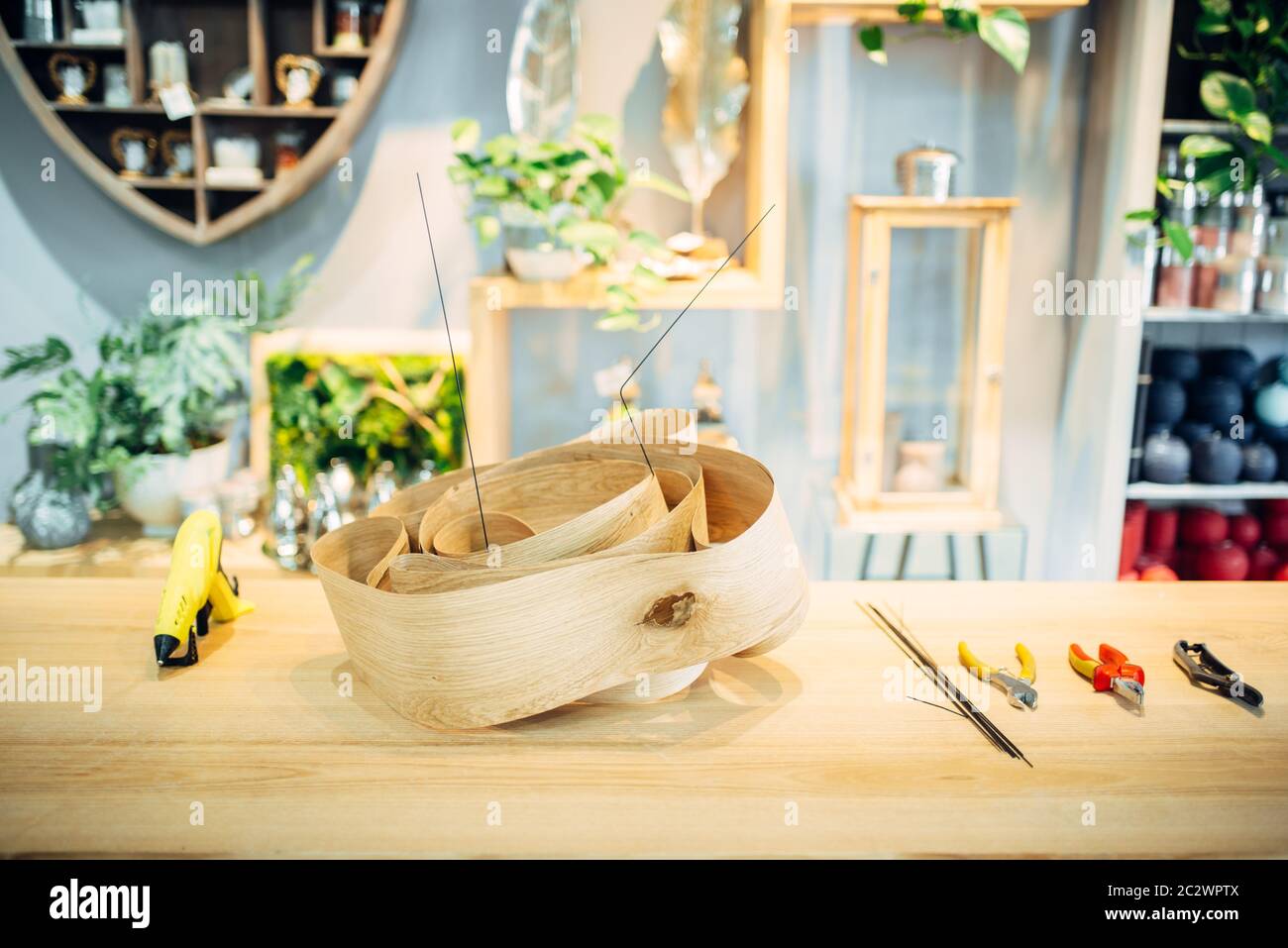 Florist tools on the table in flower shop, nobody. Decoration materials ...