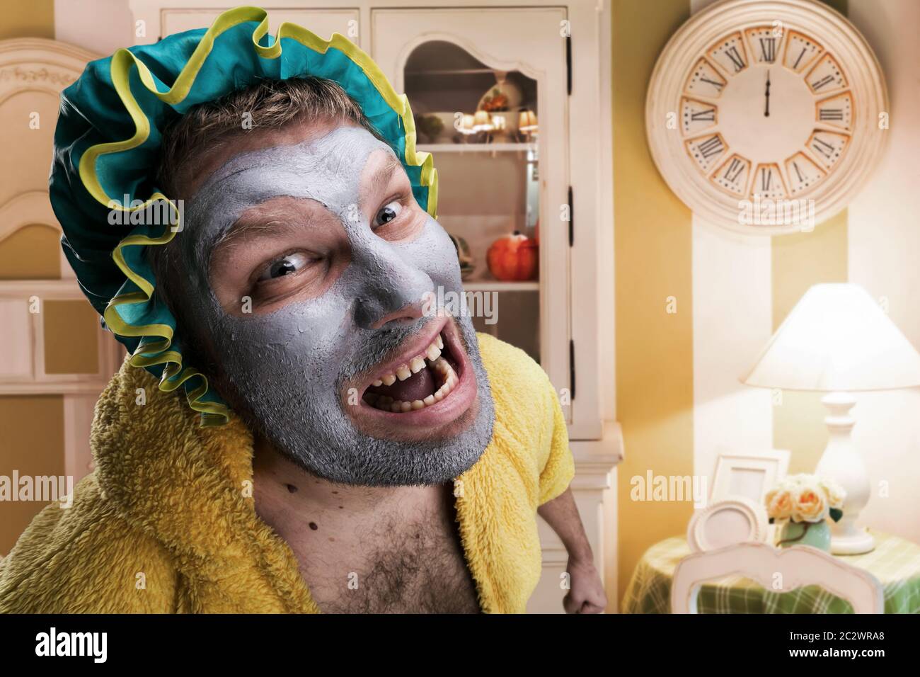 Strange man with face pack in home interior Stock Photo - Alamy