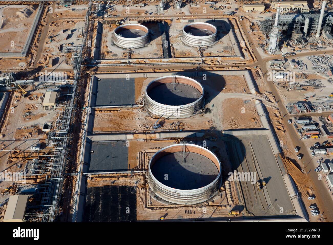 Oil tanks under construction seen from the air at a new oil facility in ...