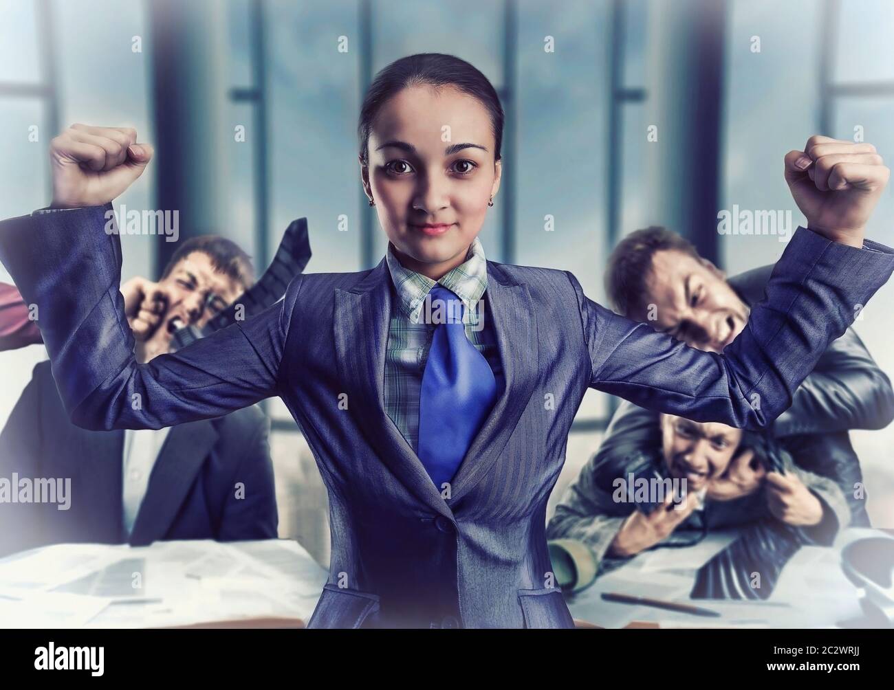 Strong woman thinking about fighting in the office Stock Photo - Alamy