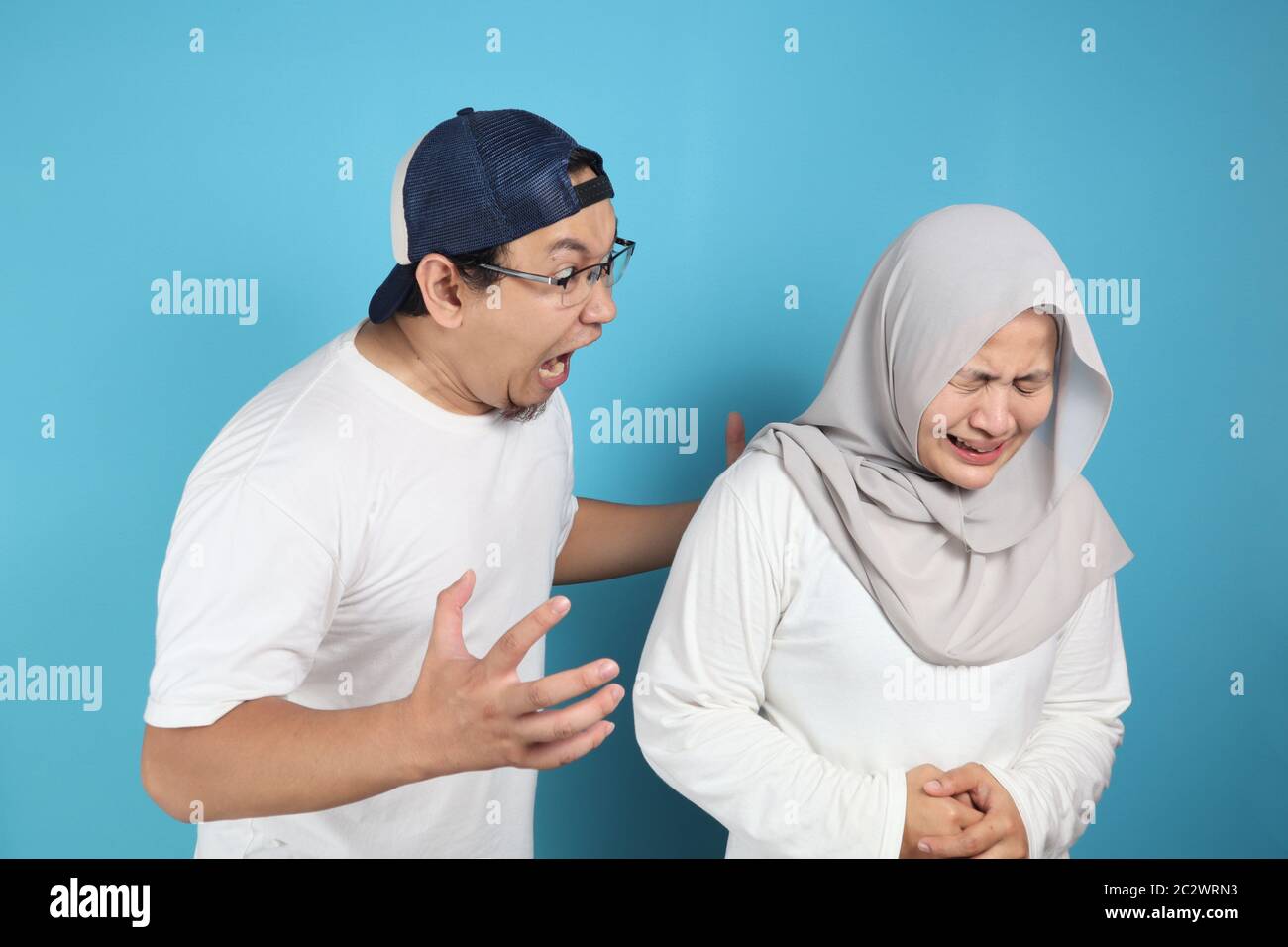 Portrait Of Funny Asian Muslim Couple Having Conflict Wife And Husband