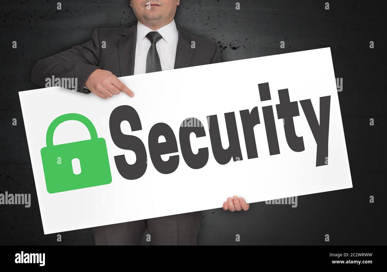 Security poster is held by businessman Stock Photo - Alamy