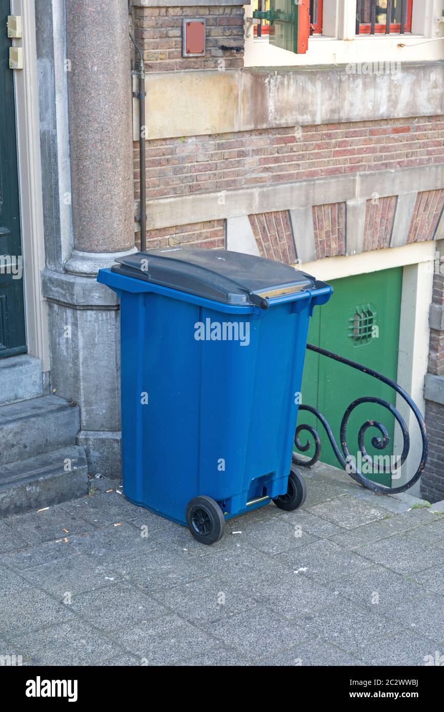 Blue wheelie bin hi-res stock photography and images - Alamy
