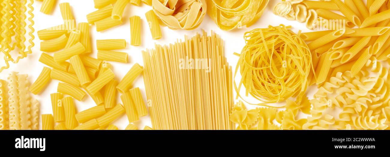 Italian pasta texture panoramic flatlay banner, overhead shot on a ...