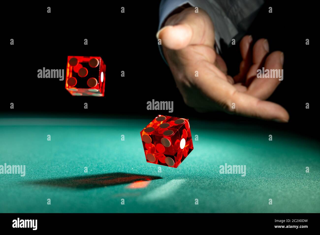Man gambling at the craps table at the casino - Selective focus Stock ...