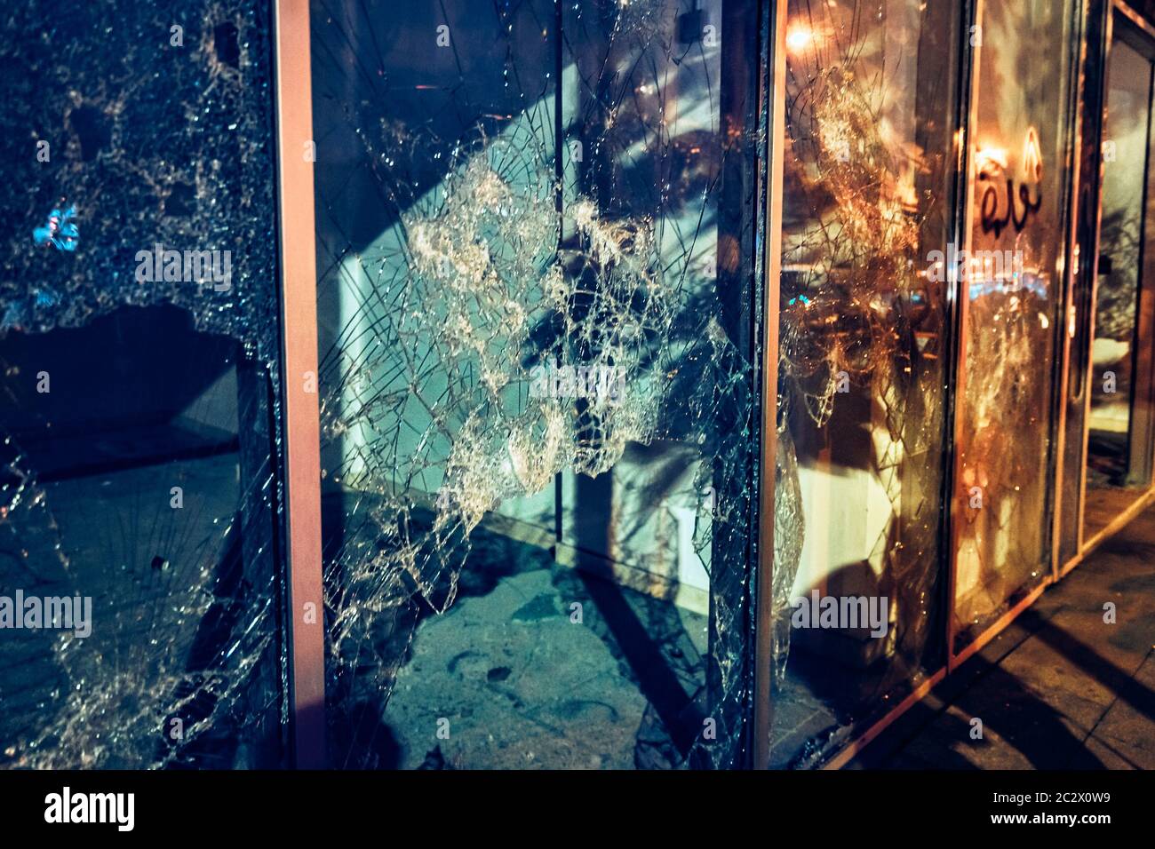 Photojournalism, broken shopfront, crime night scene, the background of ...