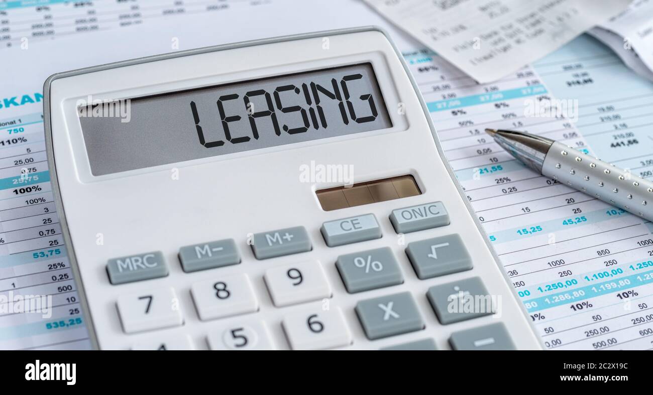 A calculator with the word Leasing on the display Stock Photo - Alamy
