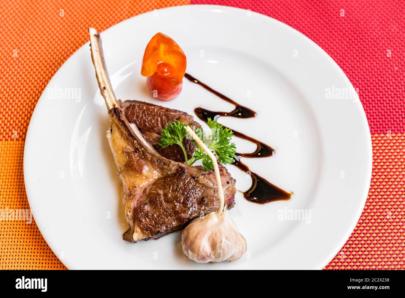 Grilled Lamb chop with garlic Stock Photo - Alamy