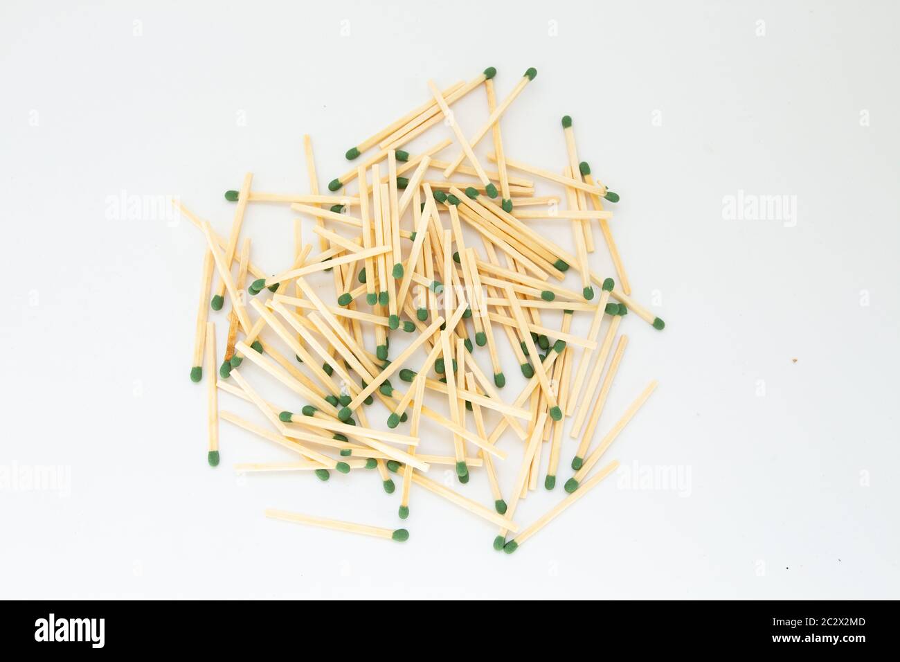 pile of matches on white background Stock Photo - Alamy