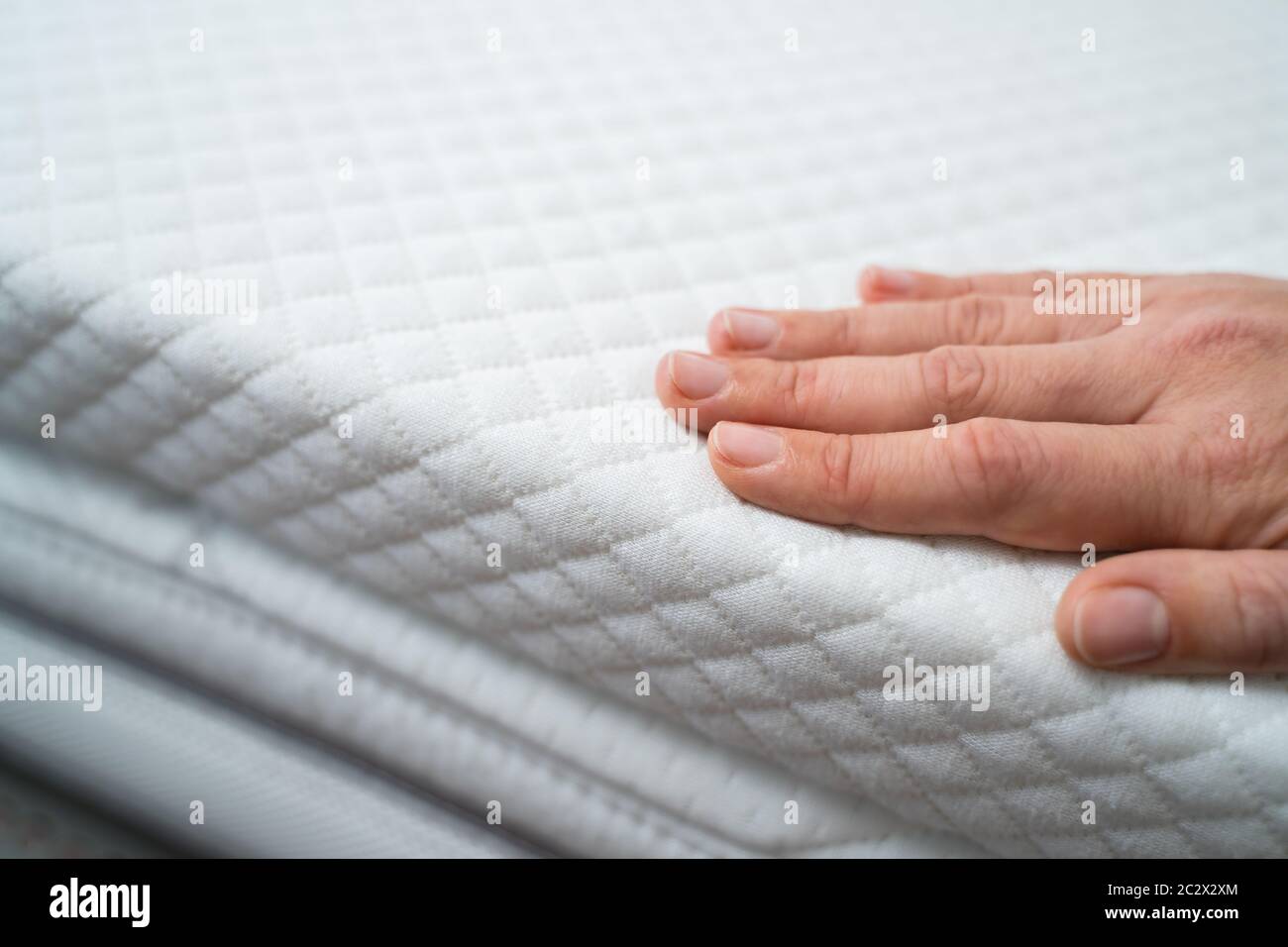 Hand Testing Orthopedic Memory Foam Core Mattress Stock Photo - Alamy