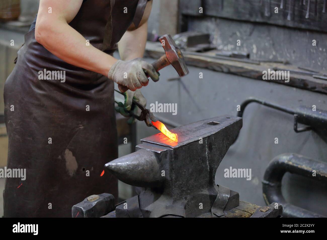 The process of manufacturing a craft product in a forge Stock Photo - Alamy