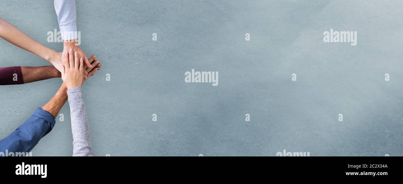 Community hands on top of each other hi-res stock photography and ...