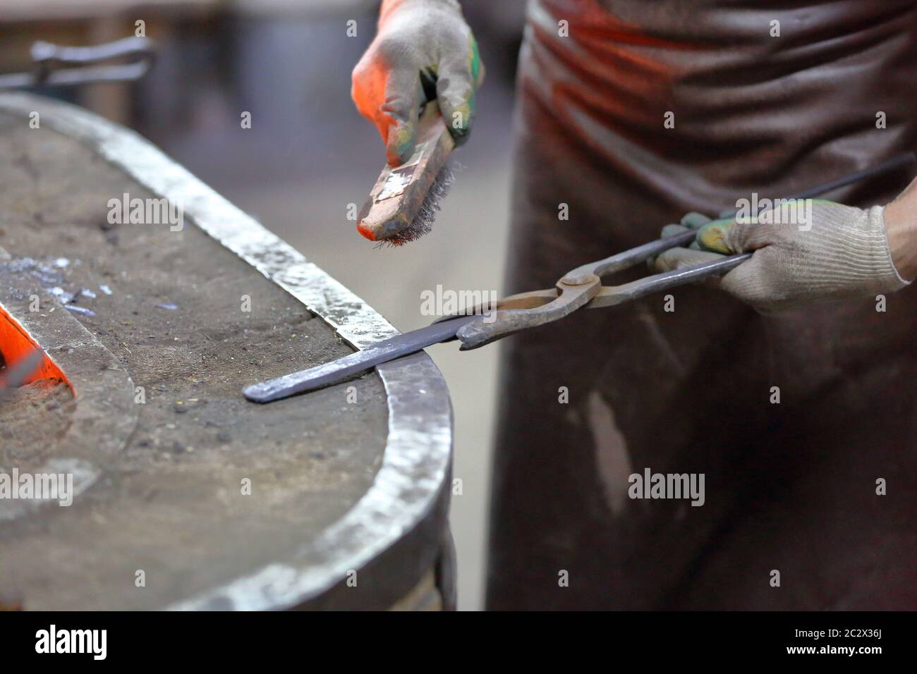 The process of manufacturing a craft product in a forge Stock Photo - Alamy