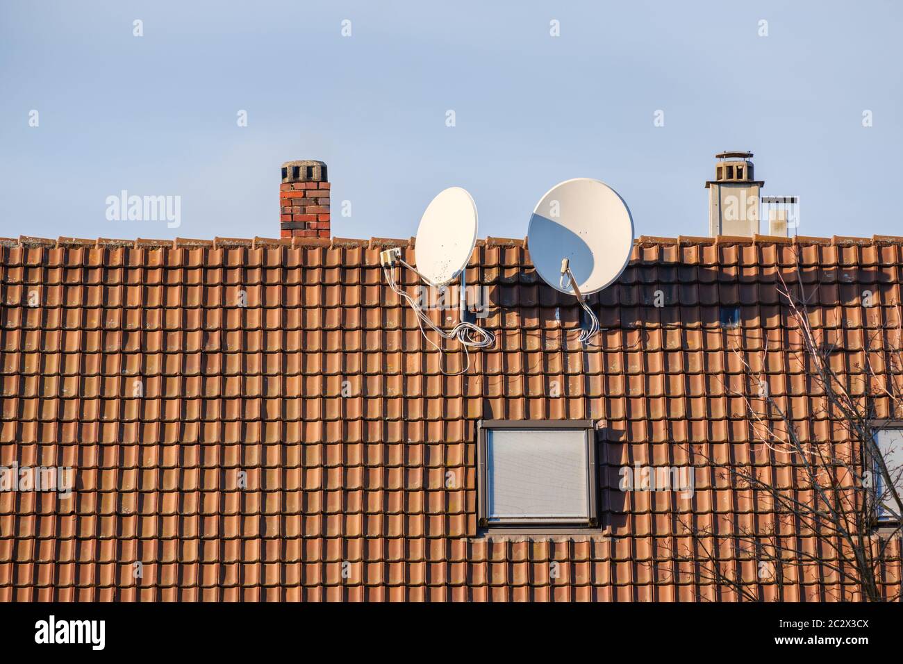 satellite dish at a roof Stock Photo - Alamy