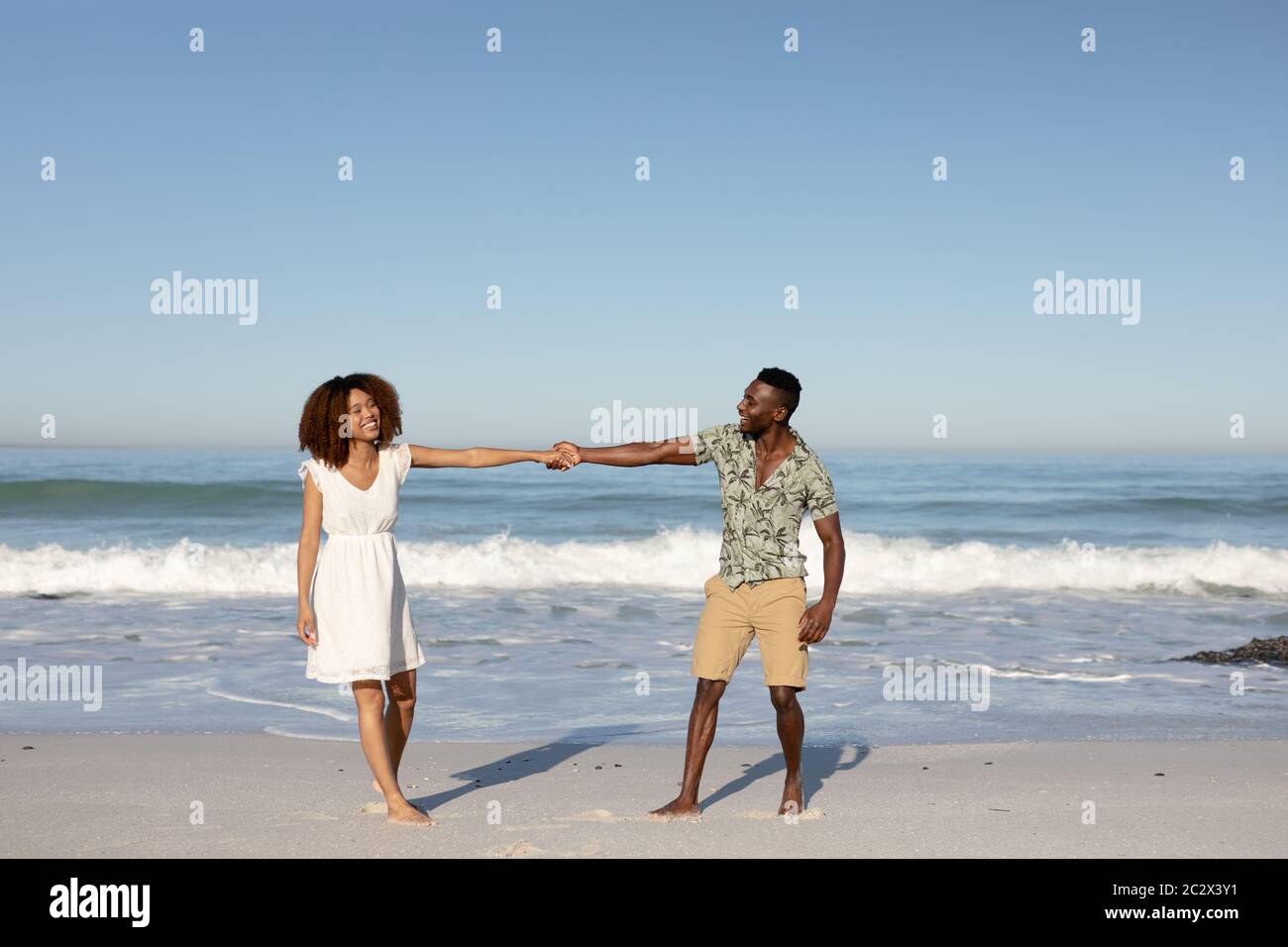 Time together on the beach hi-res stock photography and images - Alamy