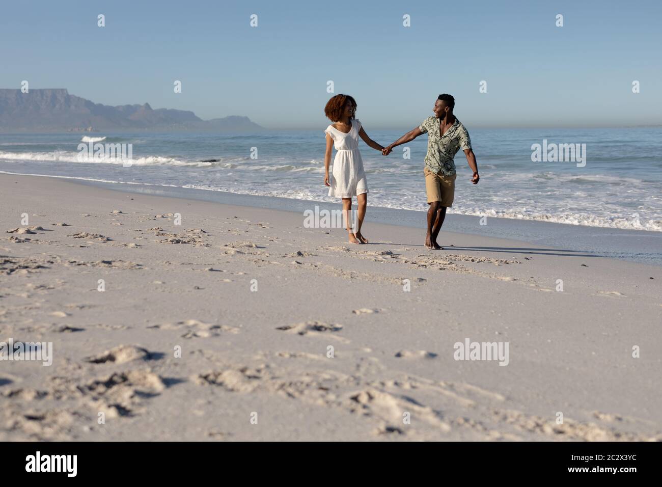 Time together on the beach hi-res stock photography and images - Alamy