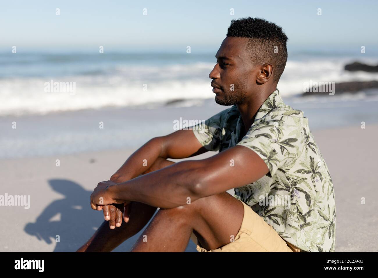 African american man enjoying his time on the beach Stock Photo - Alamy