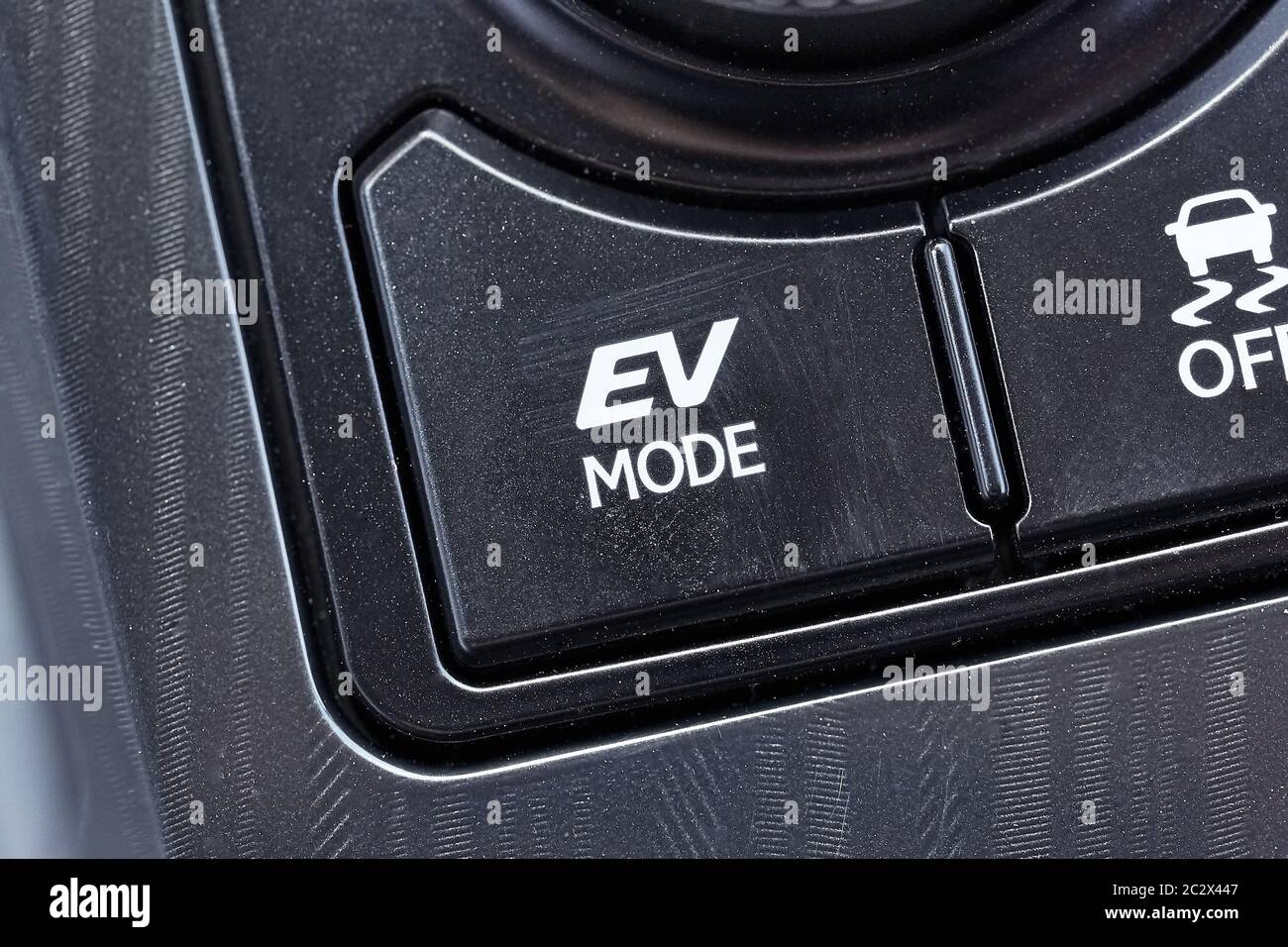 Electric Vehicle mode button of a hybrid car Stock Photo - Alamy