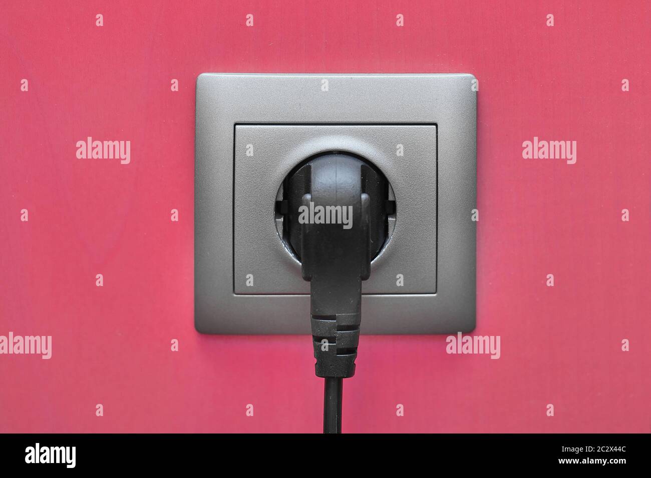 Electric outlet with cable connected Stock Photo - Alamy