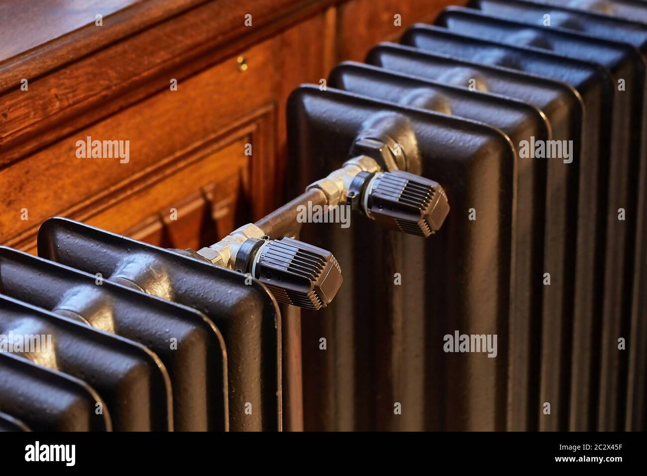 Heating radiator detail with adjusting knob Stock Photo - Alamy