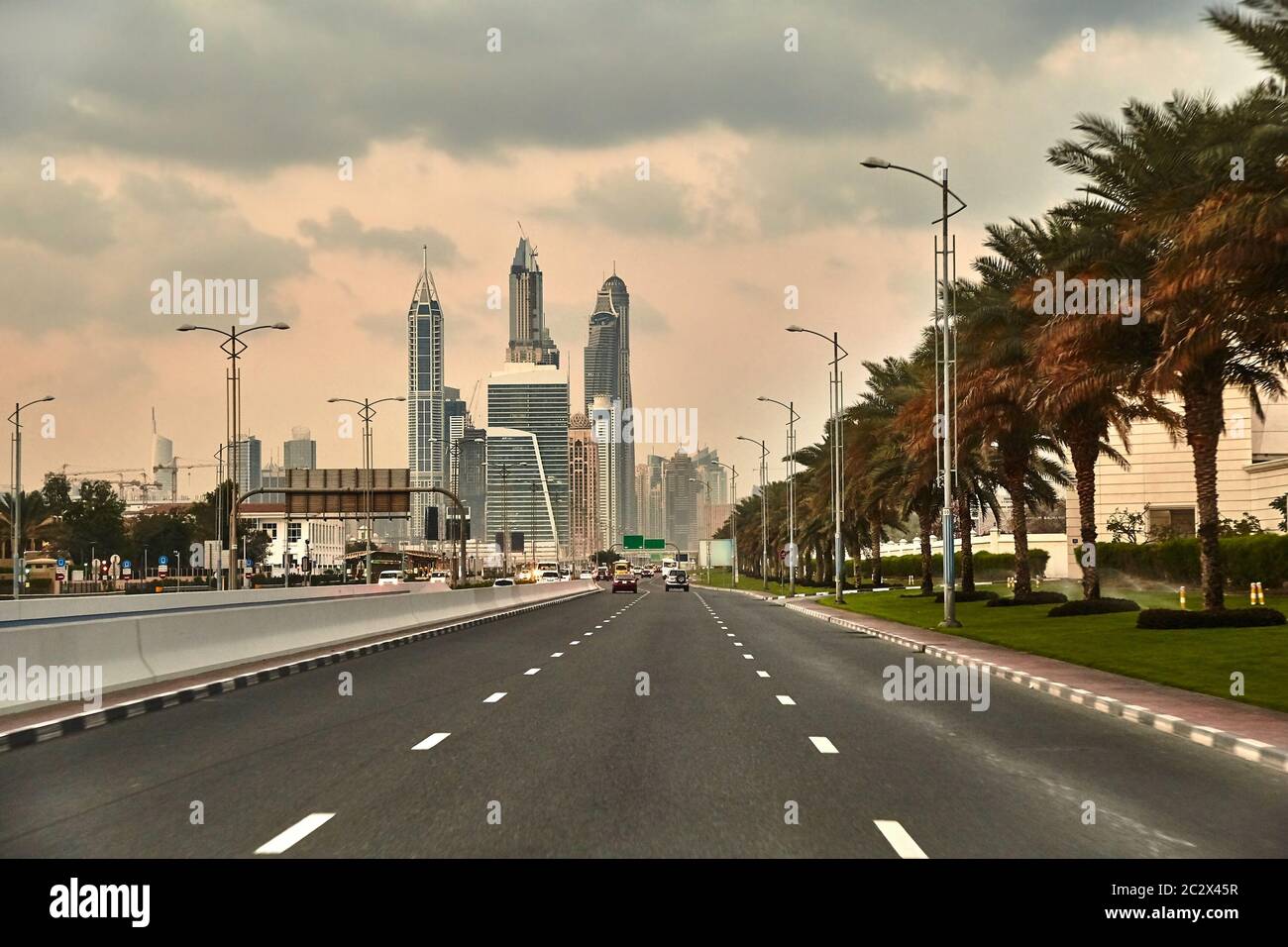 Street in Dubai with skyscrapers Stock Photo - Alamy