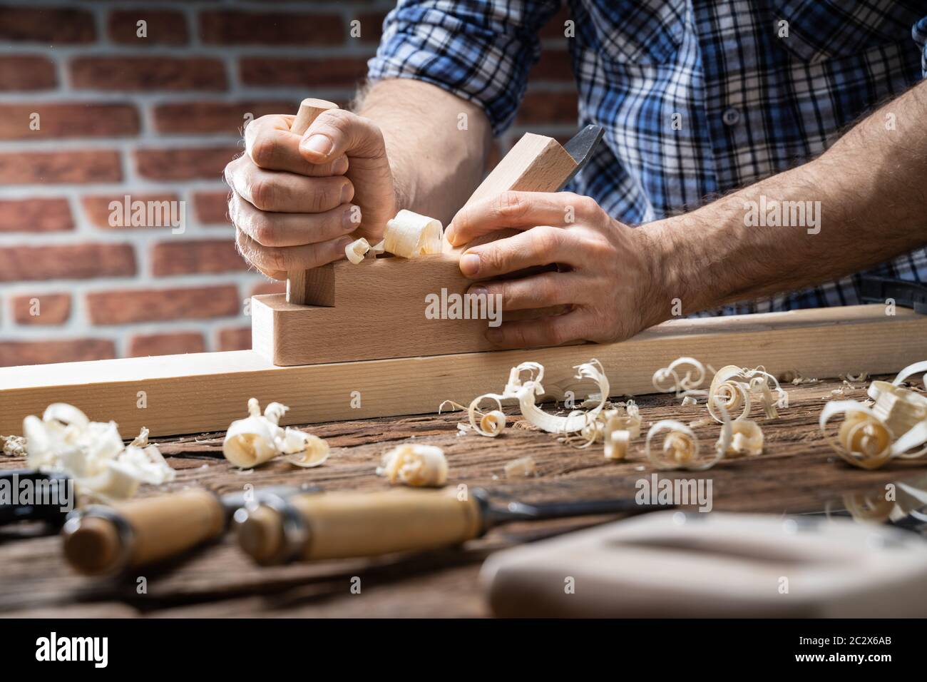 Carpenter Using Jack-plane And Various Tools From Toolkit Stock Photo ...