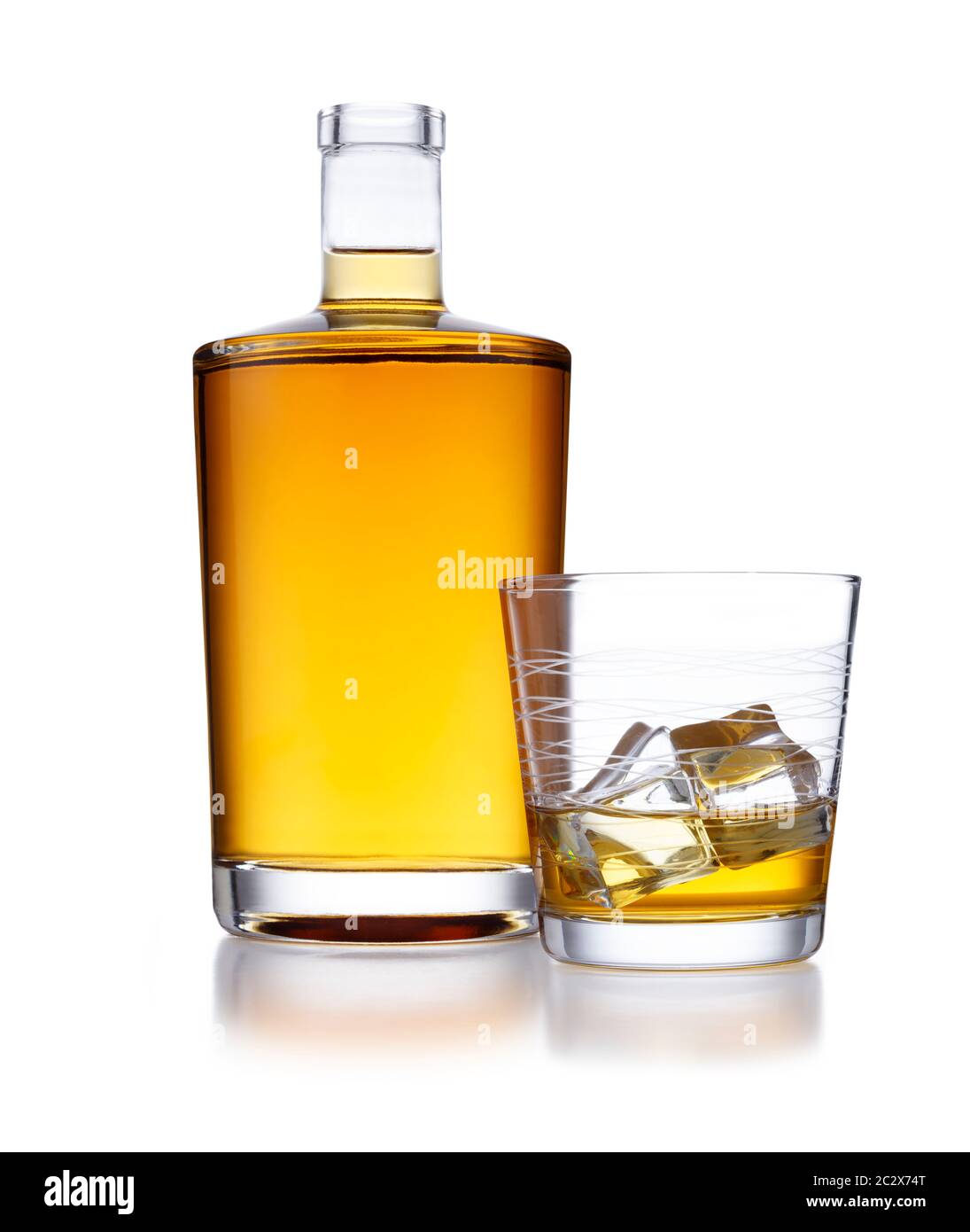 A full bottle of golden whisky, with no label or branding, and a glass ...