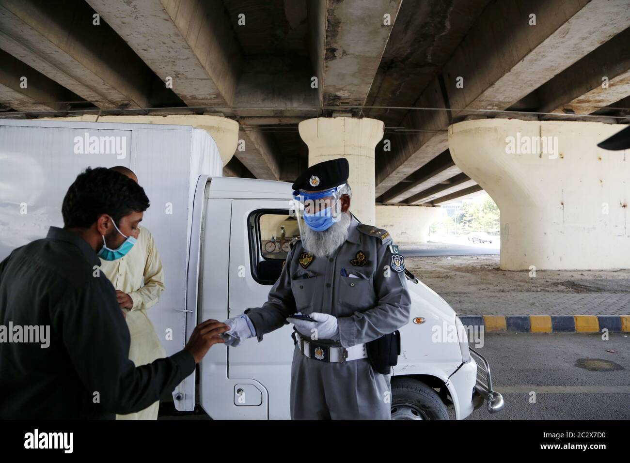 Pakistan traffic policeman hi-res stock photography and images - Alamy