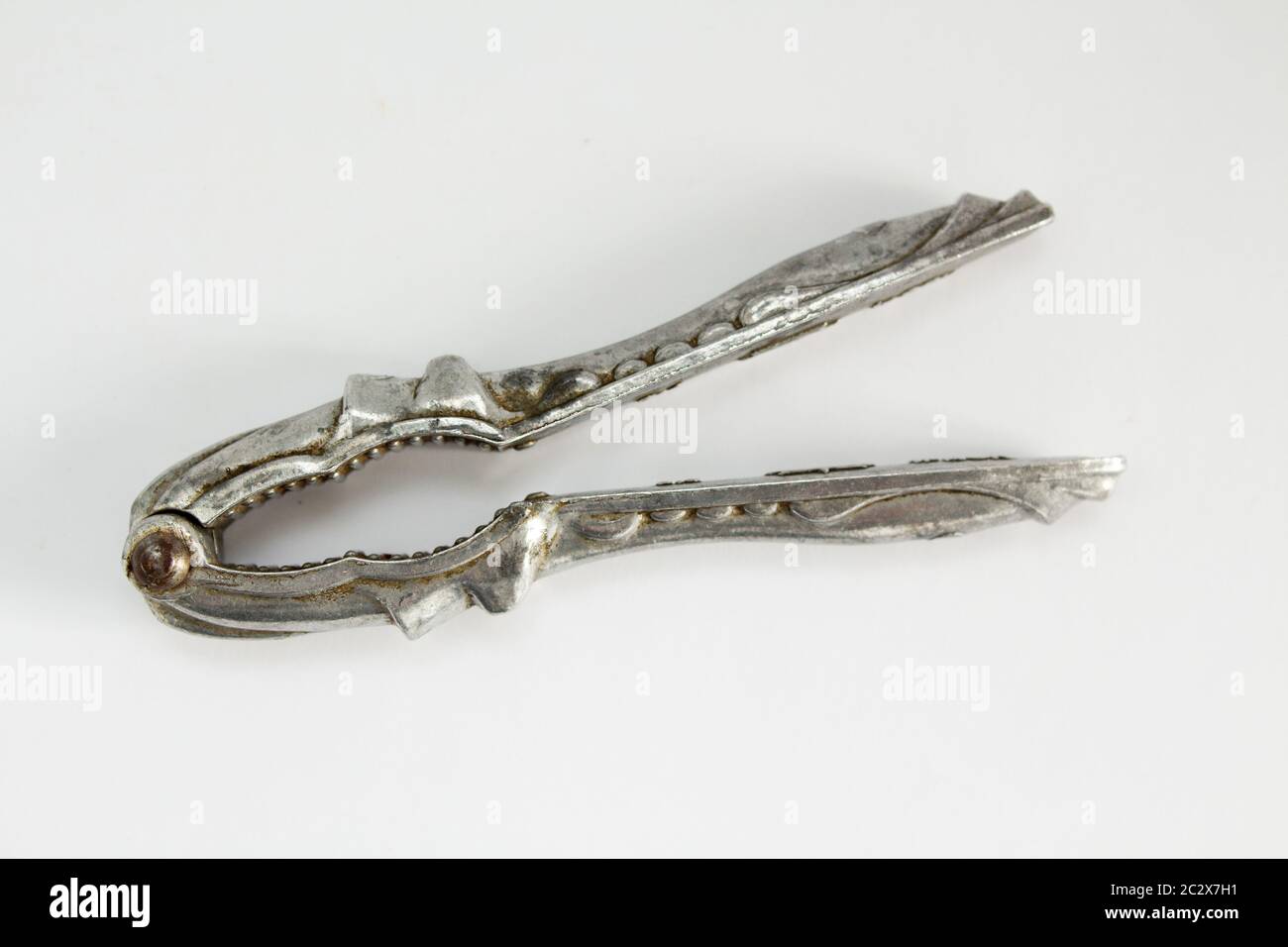 walnut cracker on white background Stock Photo - Alamy