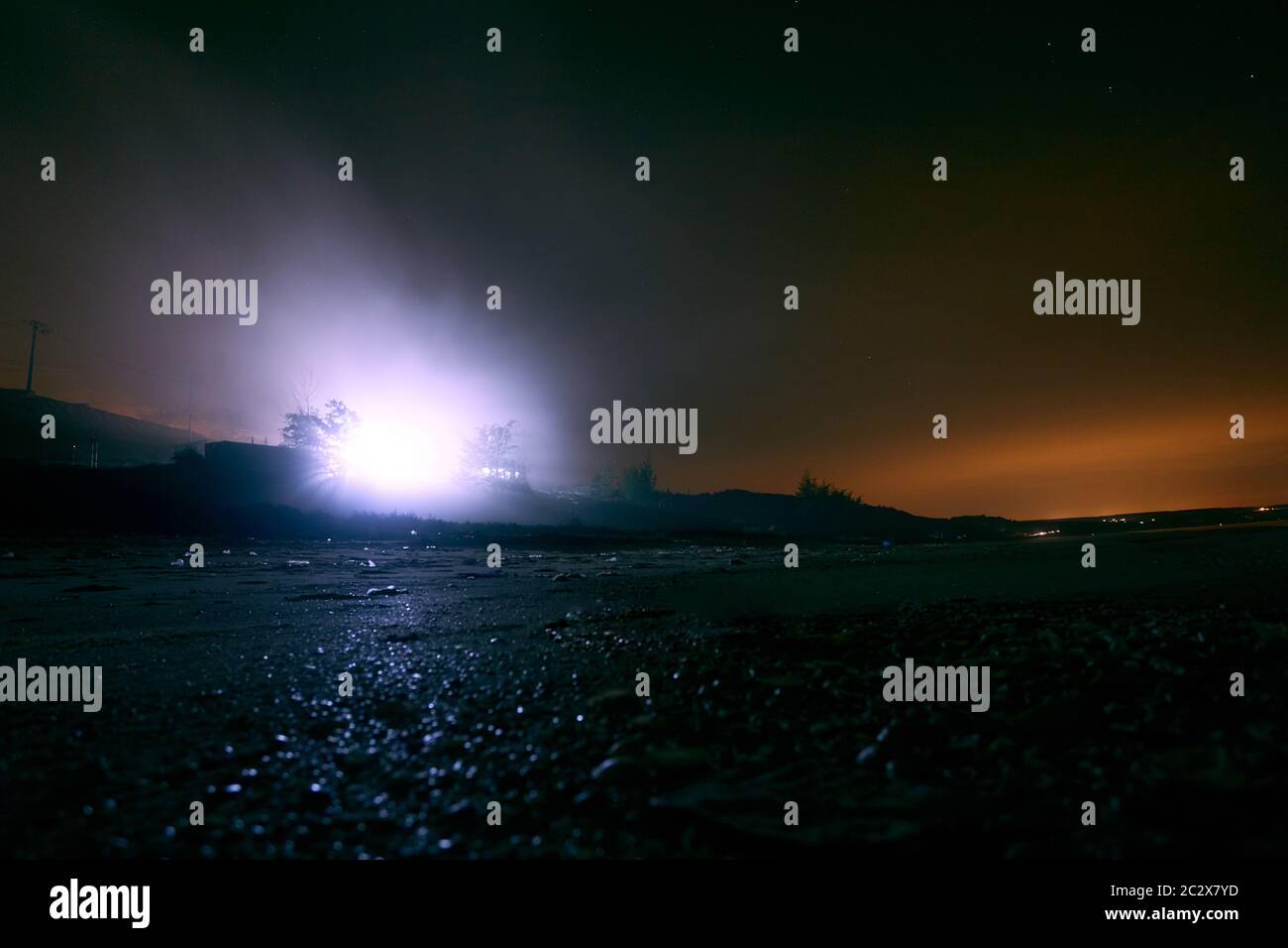 Starry night sky over sea at the beach Stock Photo - Alamy