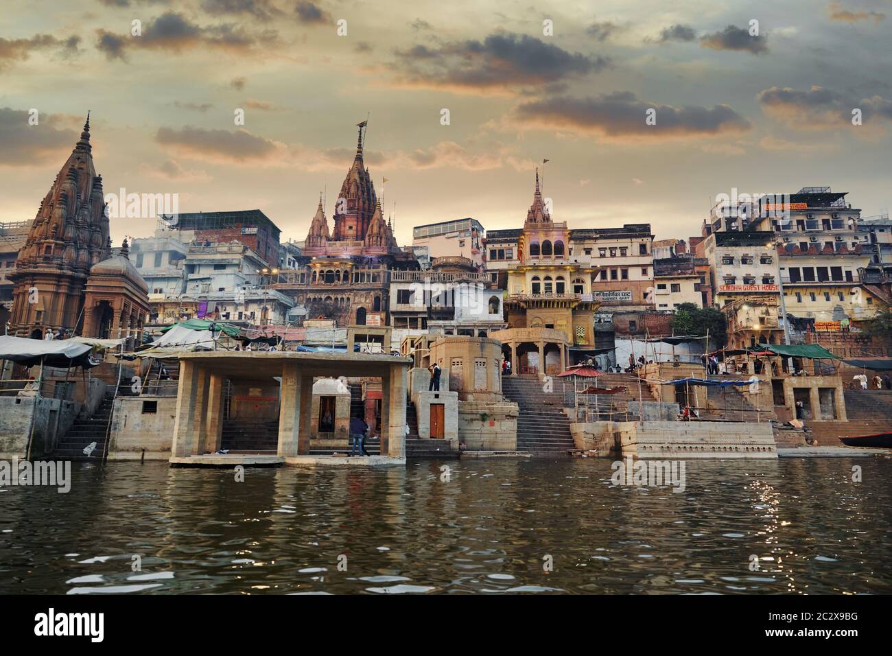 Varanasi cityscape from Ganges river side at sunset Stock Photo - Alamy