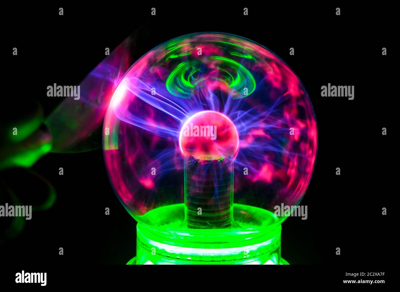 Plasma Static Electricity on a Tesla Sphere Stock Photo - Alamy