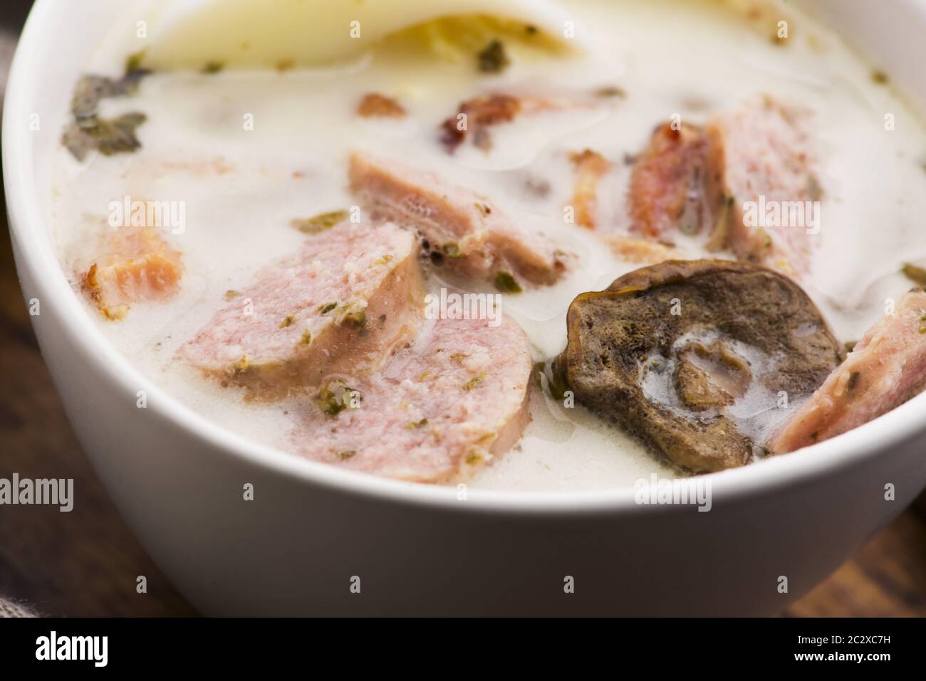Traditional easter white borscht with eggs and sausage Stock Photo - Alamy