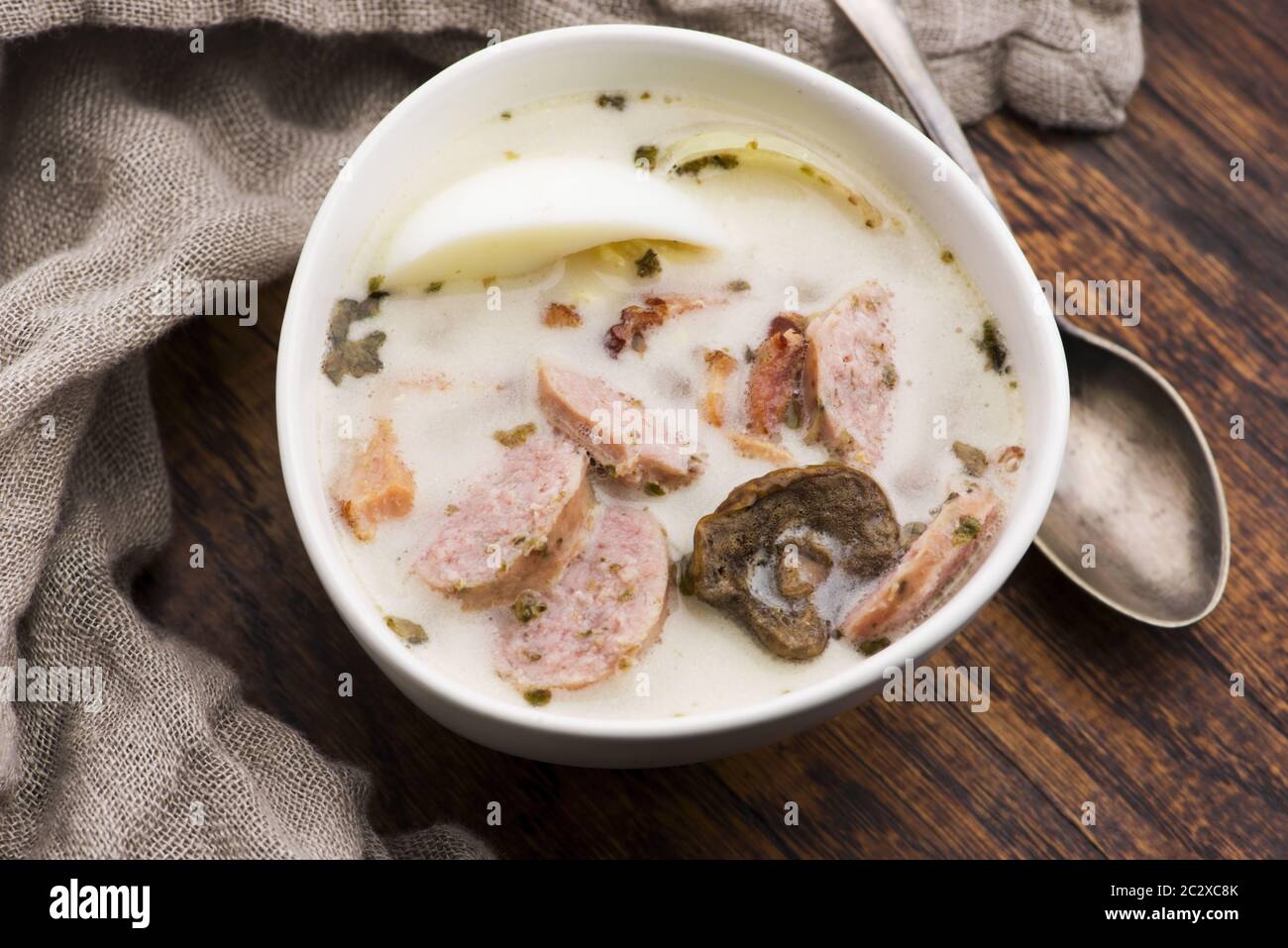 Traditional easter white borscht with eggs and sausage Stock Photo - Alamy