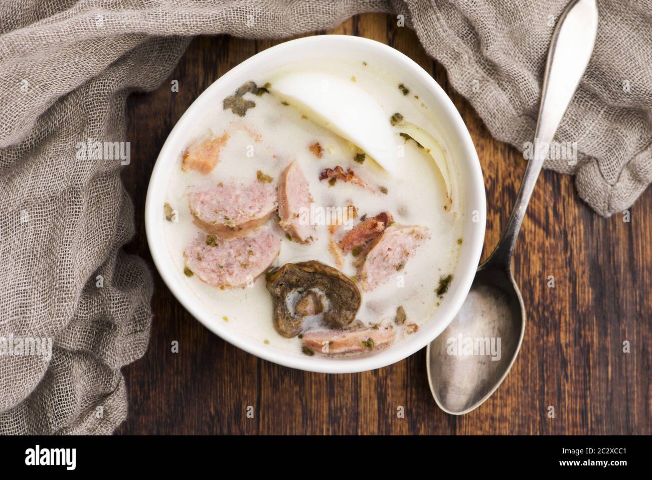 Traditional easter white borscht with eggs and sausage Stock Photo - Alamy