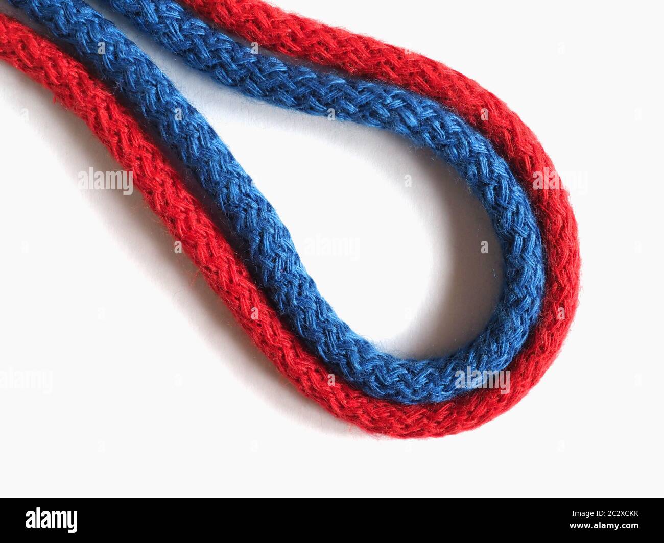 red and blue rope over off white background Stock Photo - Alamy