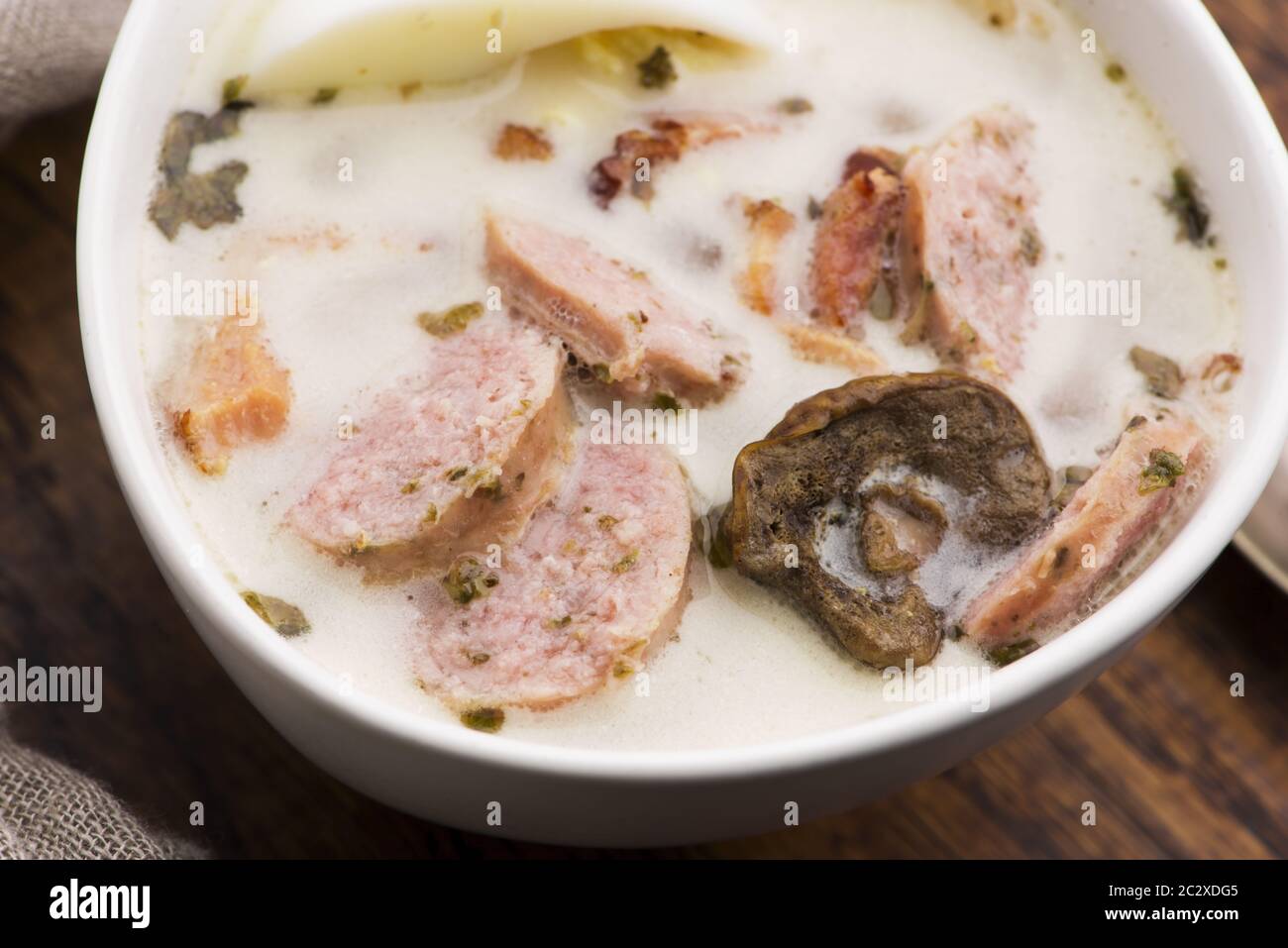 Traditional easter white borscht with eggs and sausage Stock Photo - Alamy